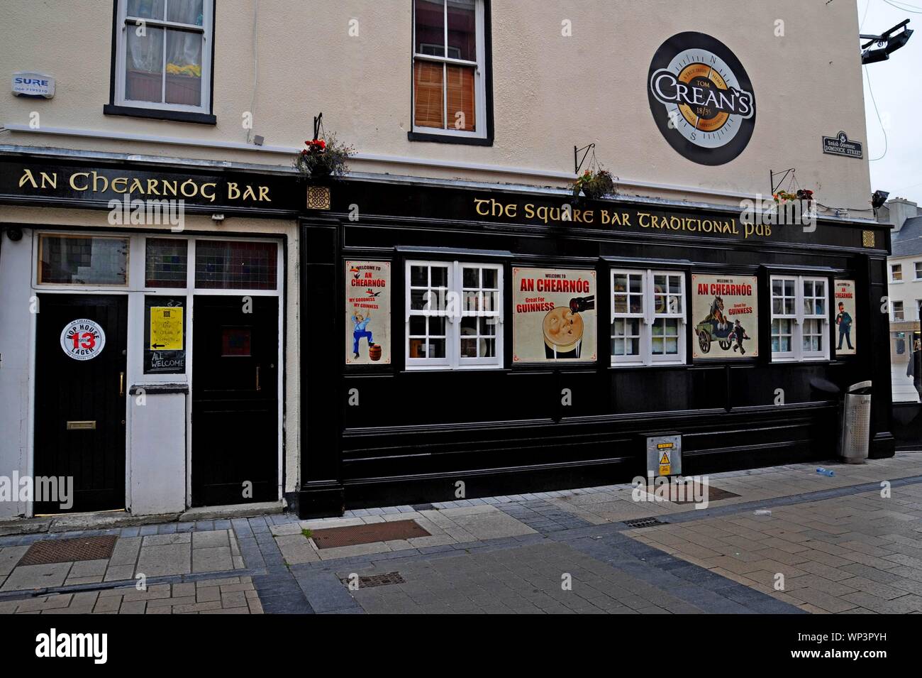 Vintage Guinness Adverts on the walls of The Square Bar traditional ...