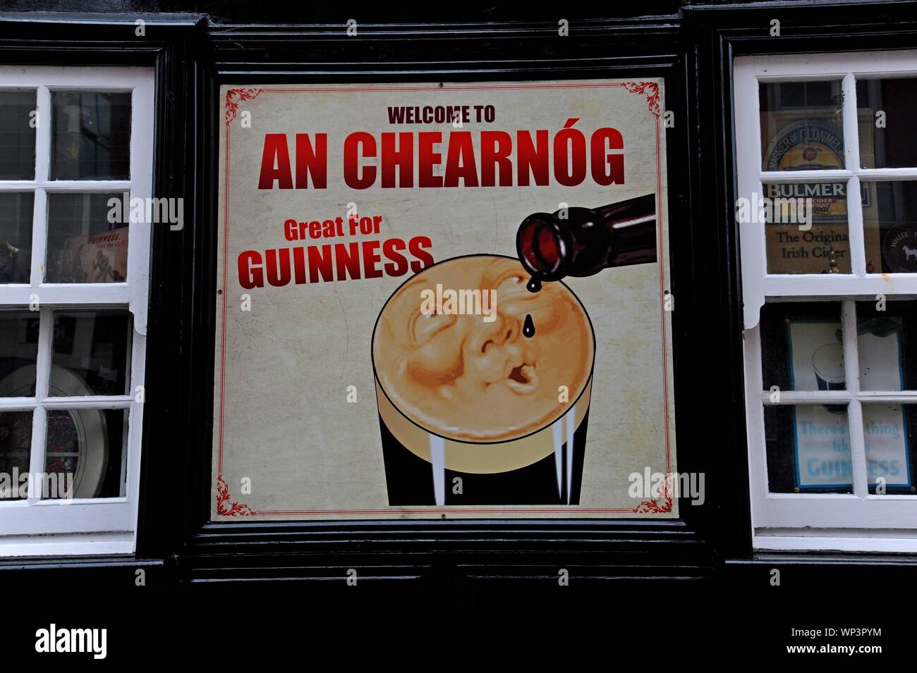 Vintage Guinness Adverts on the walls of The Square Bar traditional ...