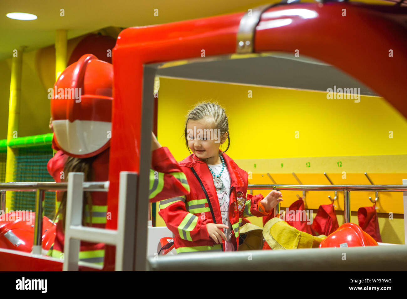 Children with fire and rescue hose hi-res stock photography and images ...