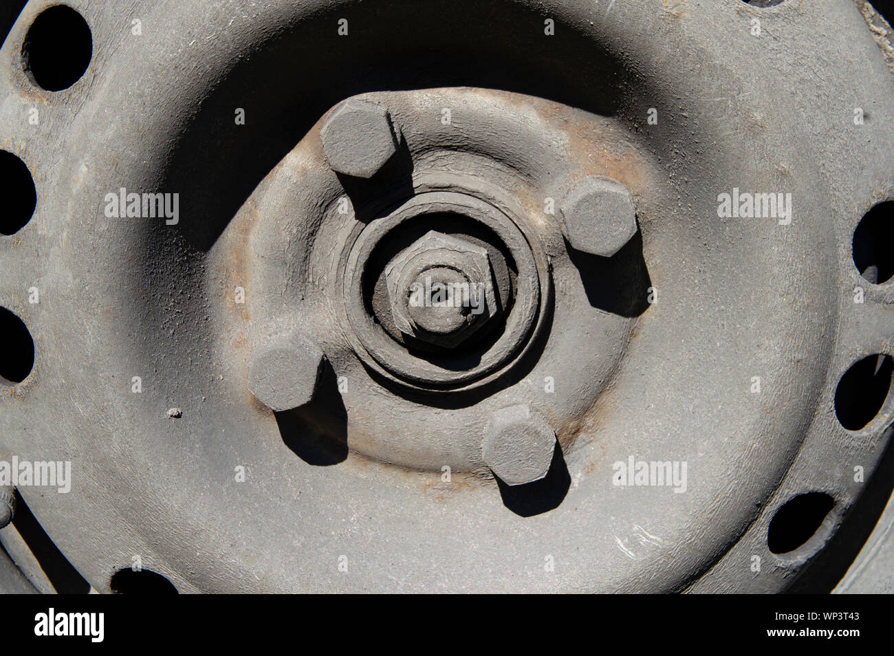 The iron disk of a car wheel - tire fitting, car repair Stock Photo - Alamy