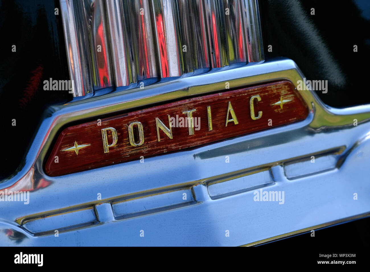 Classic cars and badges Stock Photo - Alamy