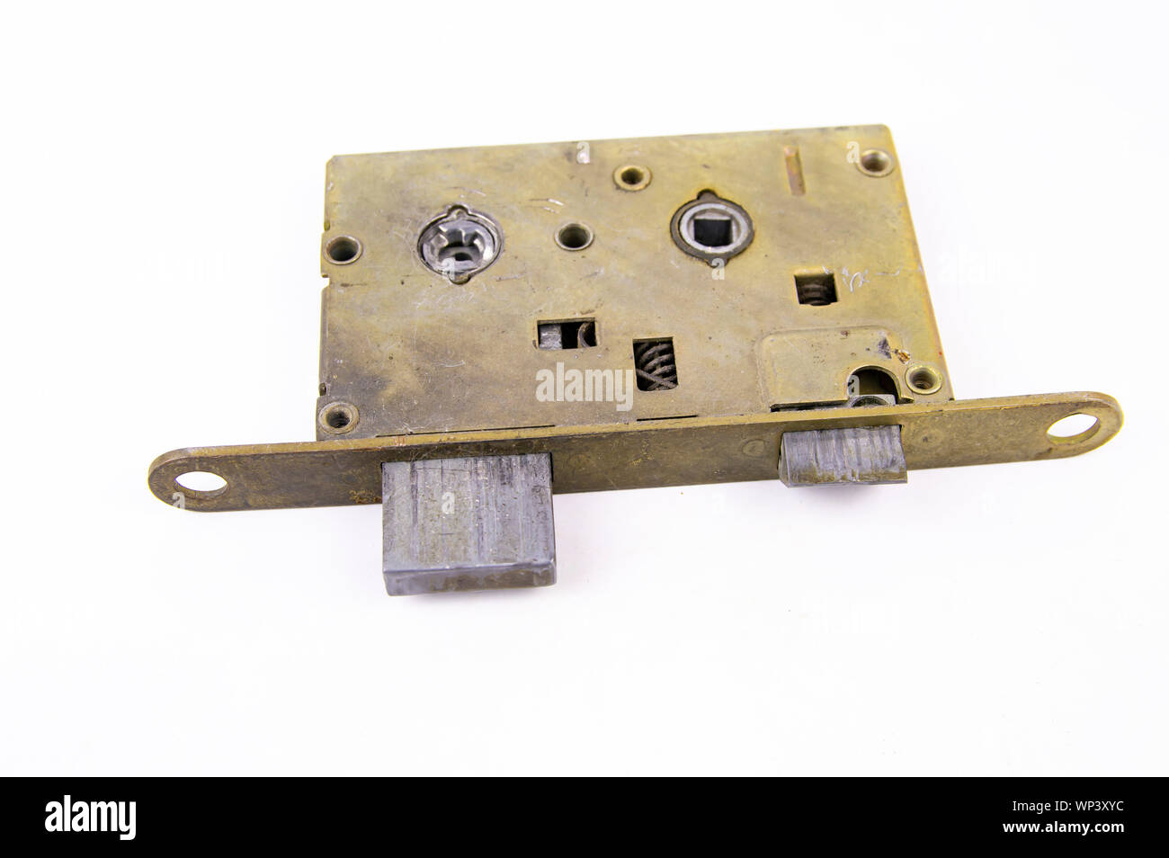 Disassembled door lock isolated against white background. Place for ...
