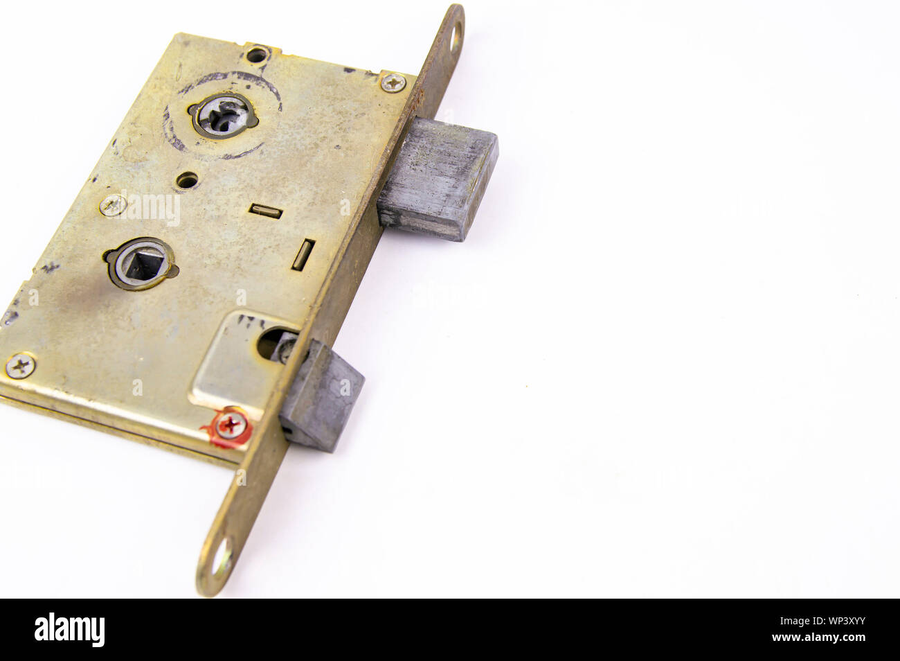 Disassembled door lock isolated against white background. Place for ...