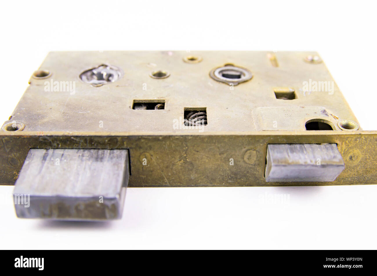 Disassembled door lock isolated against white background. Place for ...