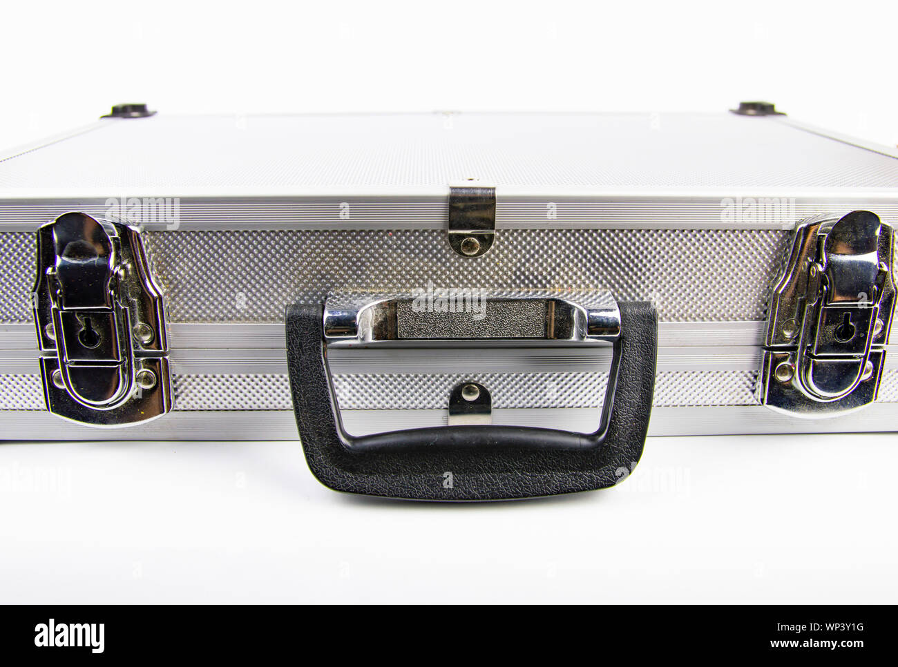 Aluminum case for a working tool on a white background, free space for ...
