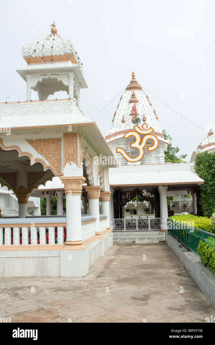 Om symbol on a temple, Chhatarpur Temple, Chhatarpur, New Delhi, India ...