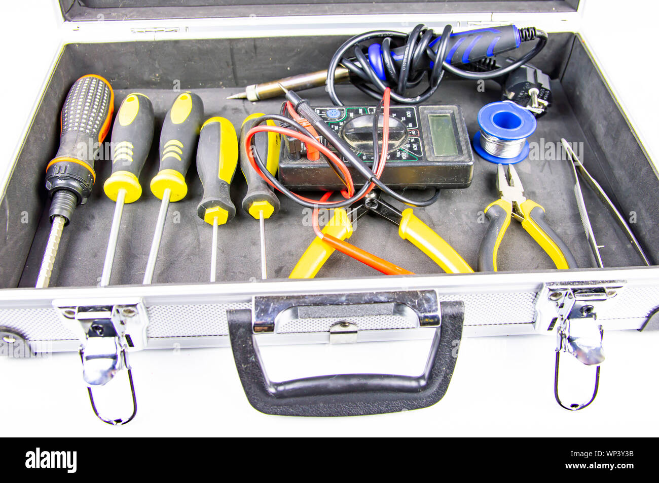 Aluminum case with a working tool on a white background - screwdrivers ...