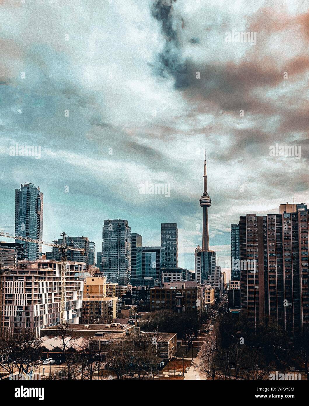 Beautiful shot of an urban city skyline with buildings and radio tower ...