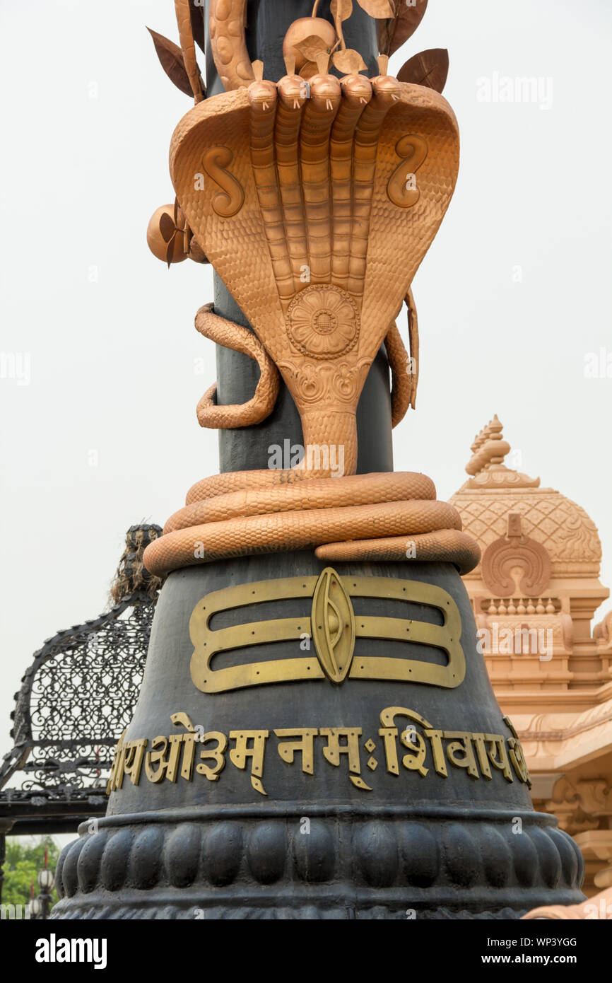 Close-up of snake around a trishul, Chhatarpur Temple, Chhatarpur, New ...