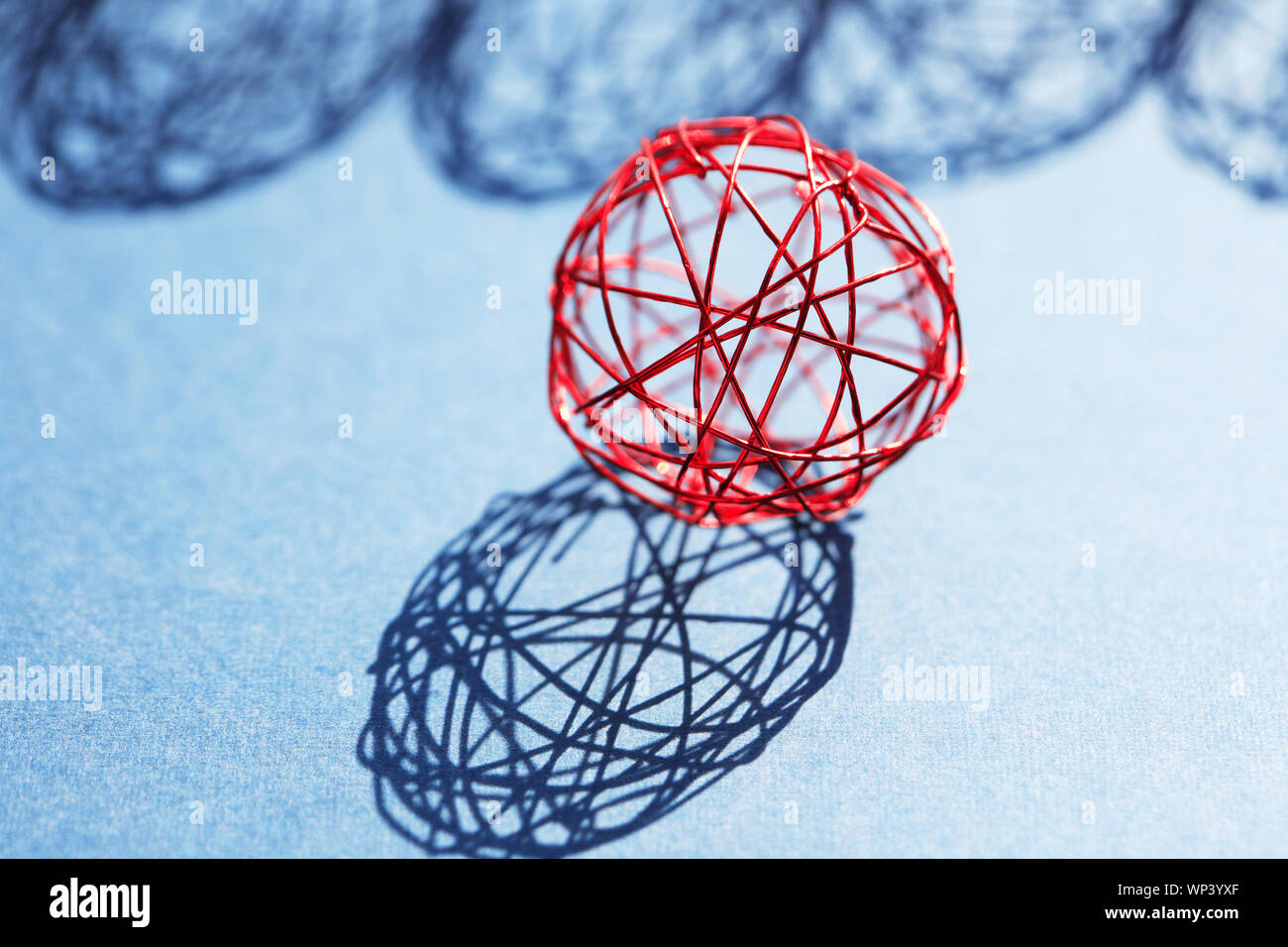 Set of red balls made from wire in a row against sun light Stock Photo ...