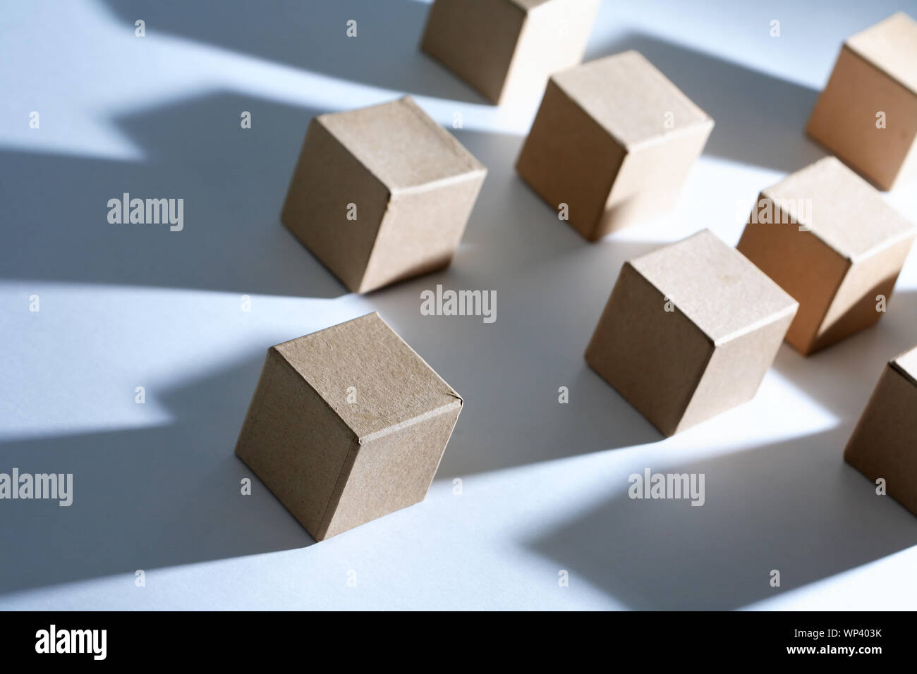 Set of cardboard cubes on white background with light and shadows Stock ...