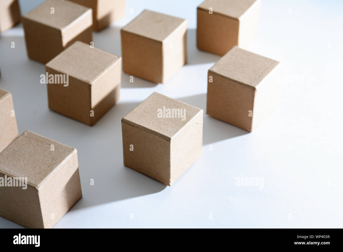 Set of cardboard cubes on white background with light and shadows Stock ...