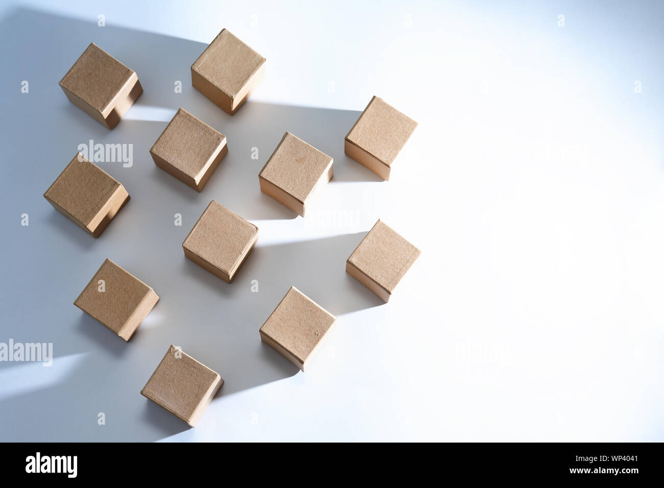 Set of cardboard cubes on white background with light and shadows Stock ...