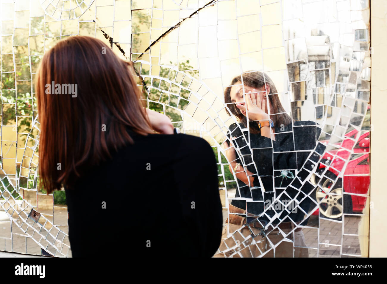 Mirror reflection on people walking hi-res stock photography and images ...