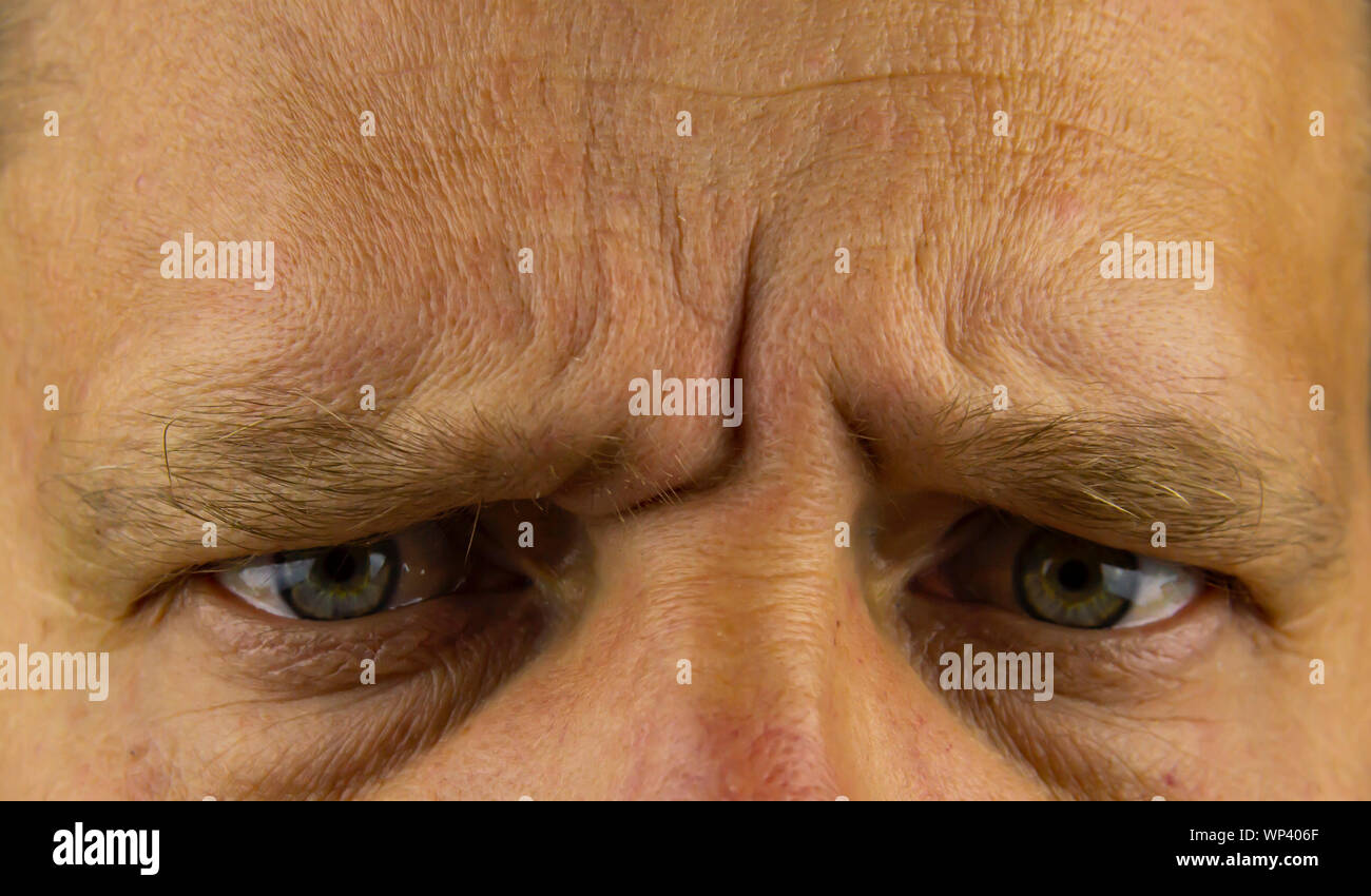 The eyes of a person without a face are middle-aged men. Background ...