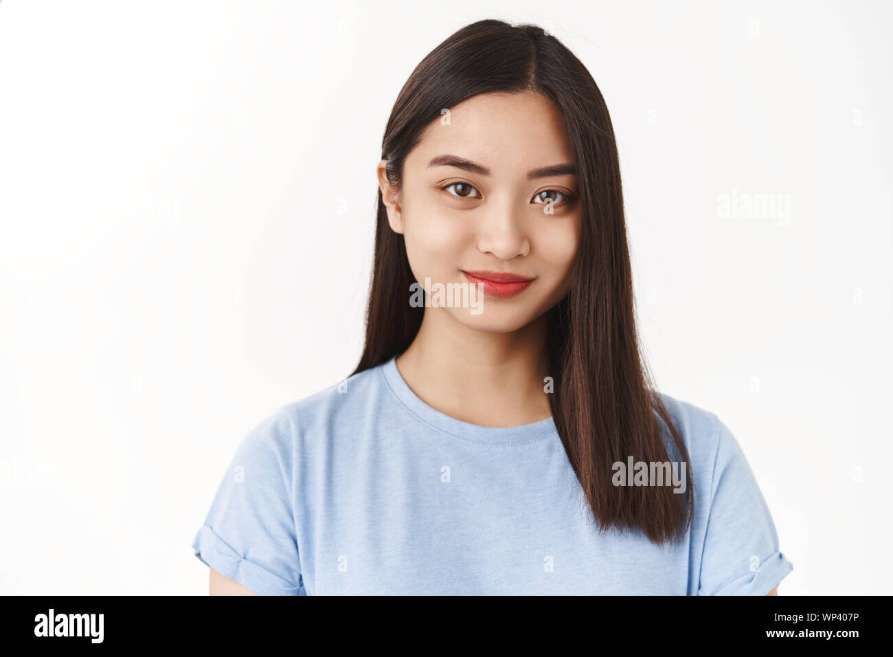 Close-up cute shy attractive asian brunette girl smiling delighted ...