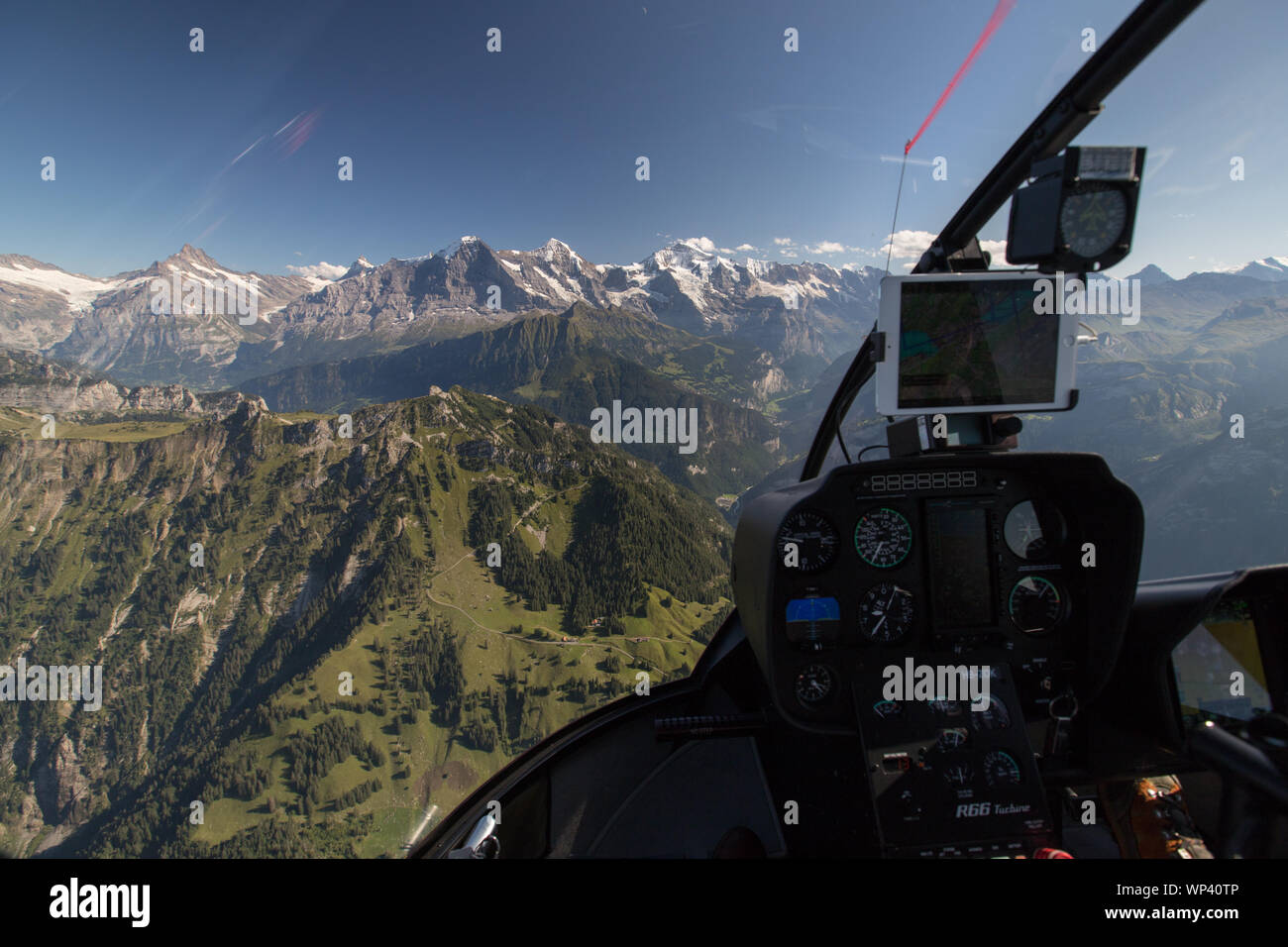 Helicopter ride through the Swiss alps Stock Photo - Alamy