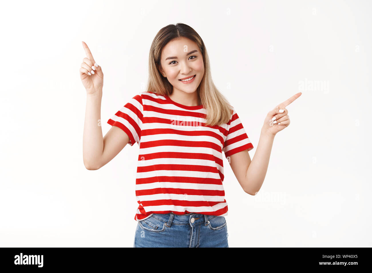 Girl asking opinion shopping store raising hands pointing left right ...