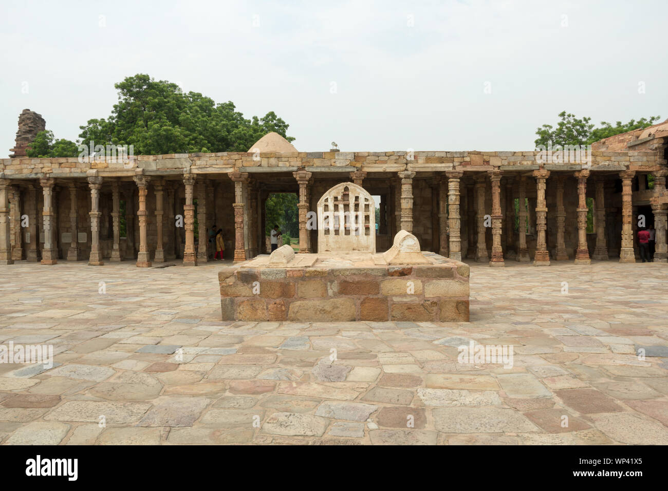 Ruins of a mosque with tombstone at qutub complex, Qutub Minar, New ...