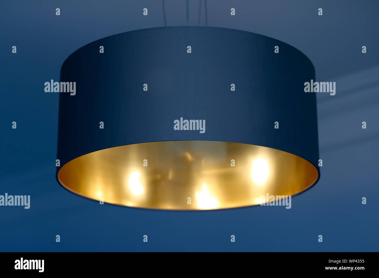 Interior design, indoor lamps and electricity concept - Golden lamp in ...