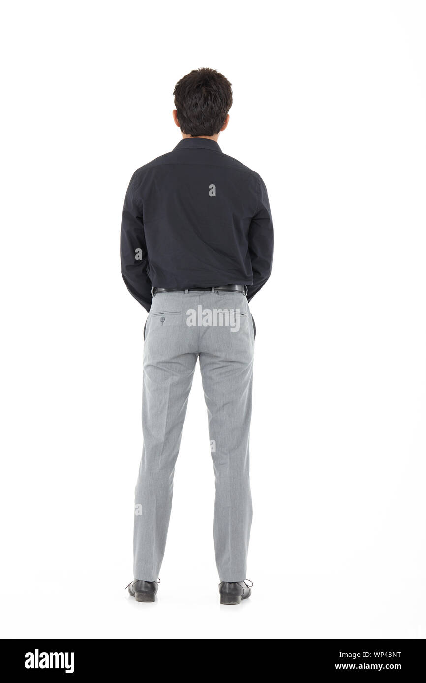 Rear view of a businessman standing Stock Photo - Alamy