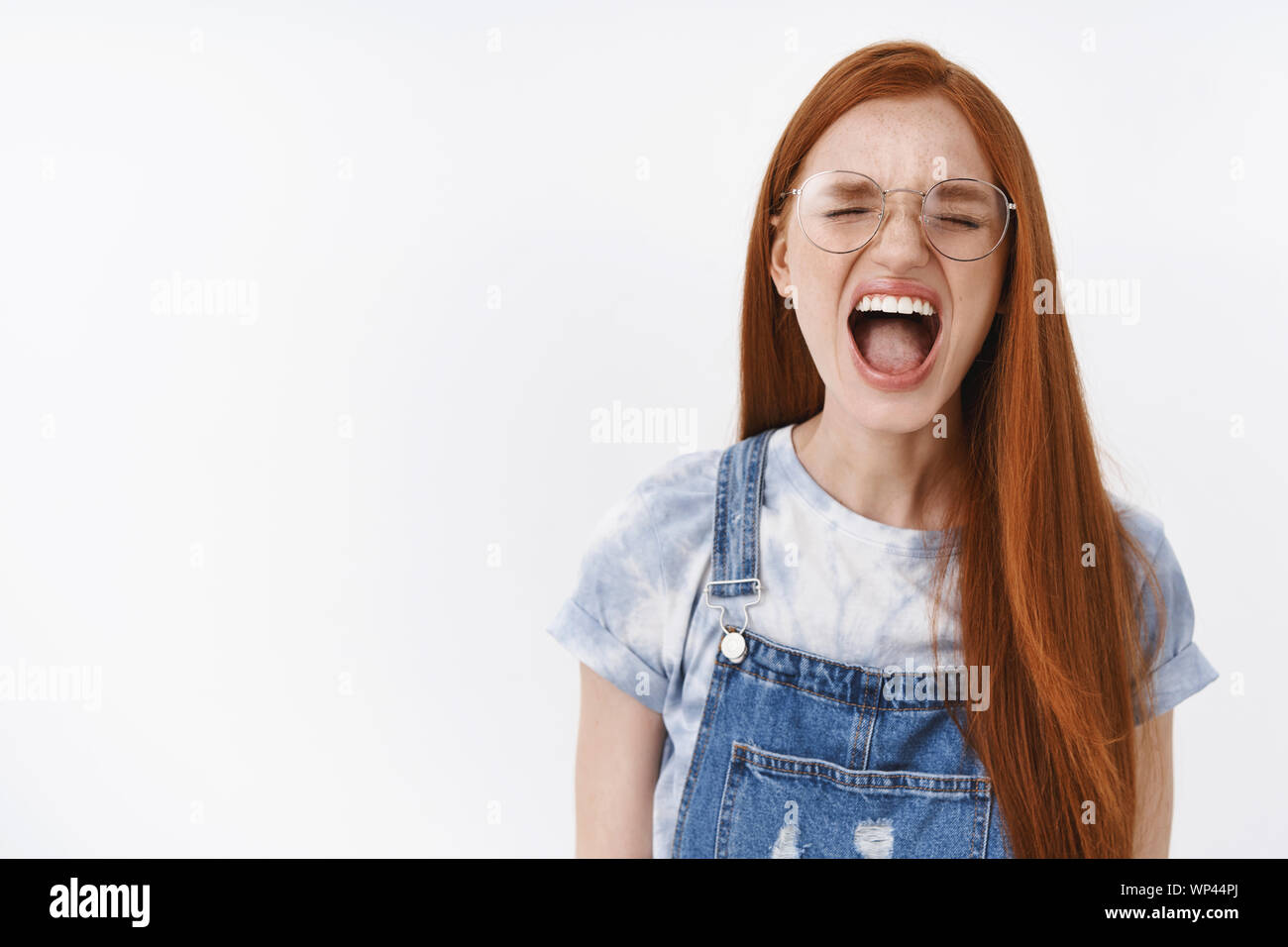 Stop it, cannot bear anymore. Fed up distressed young upset redhead ...