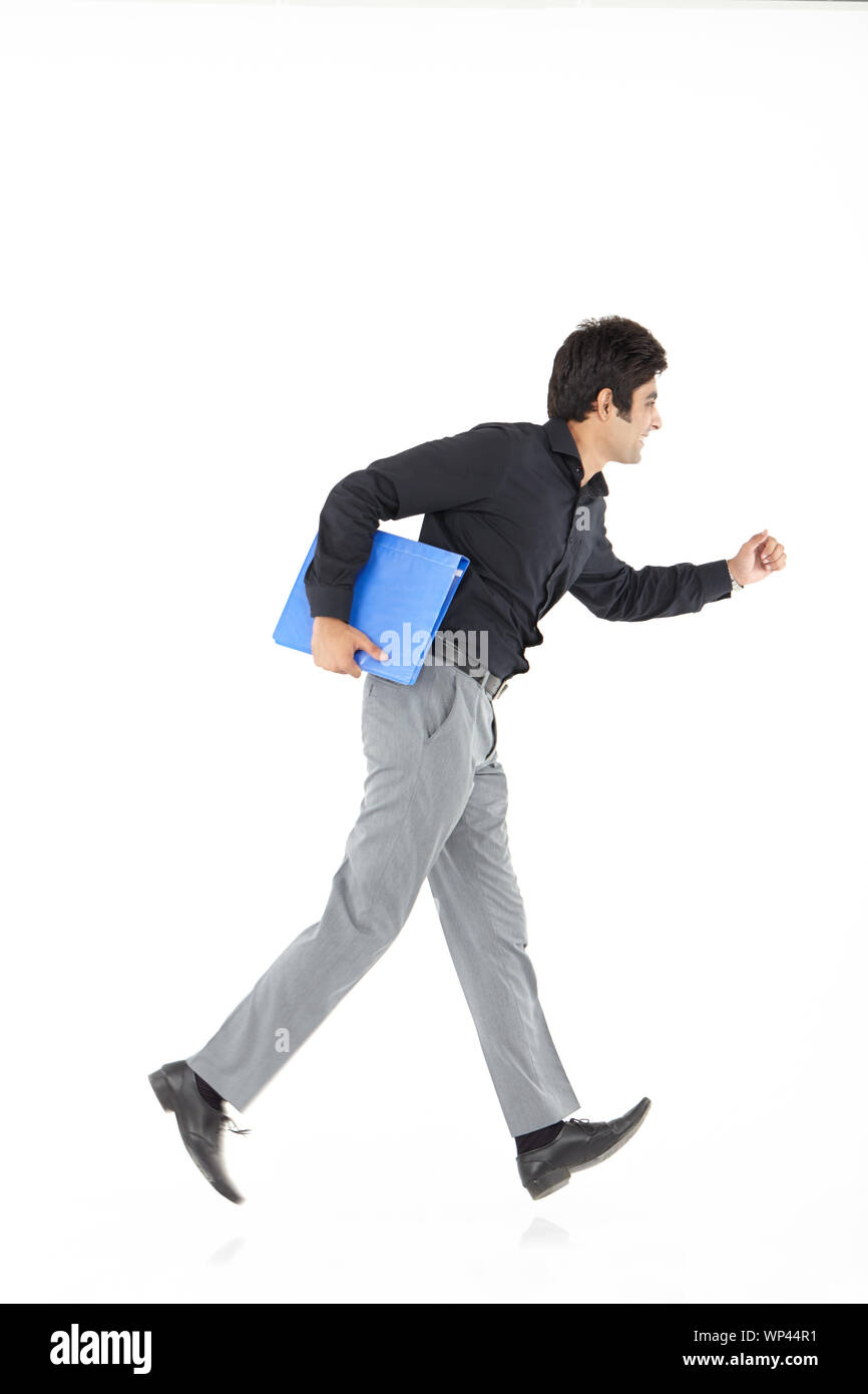 Indian businessman running file hi-res stock photography and images - Alamy