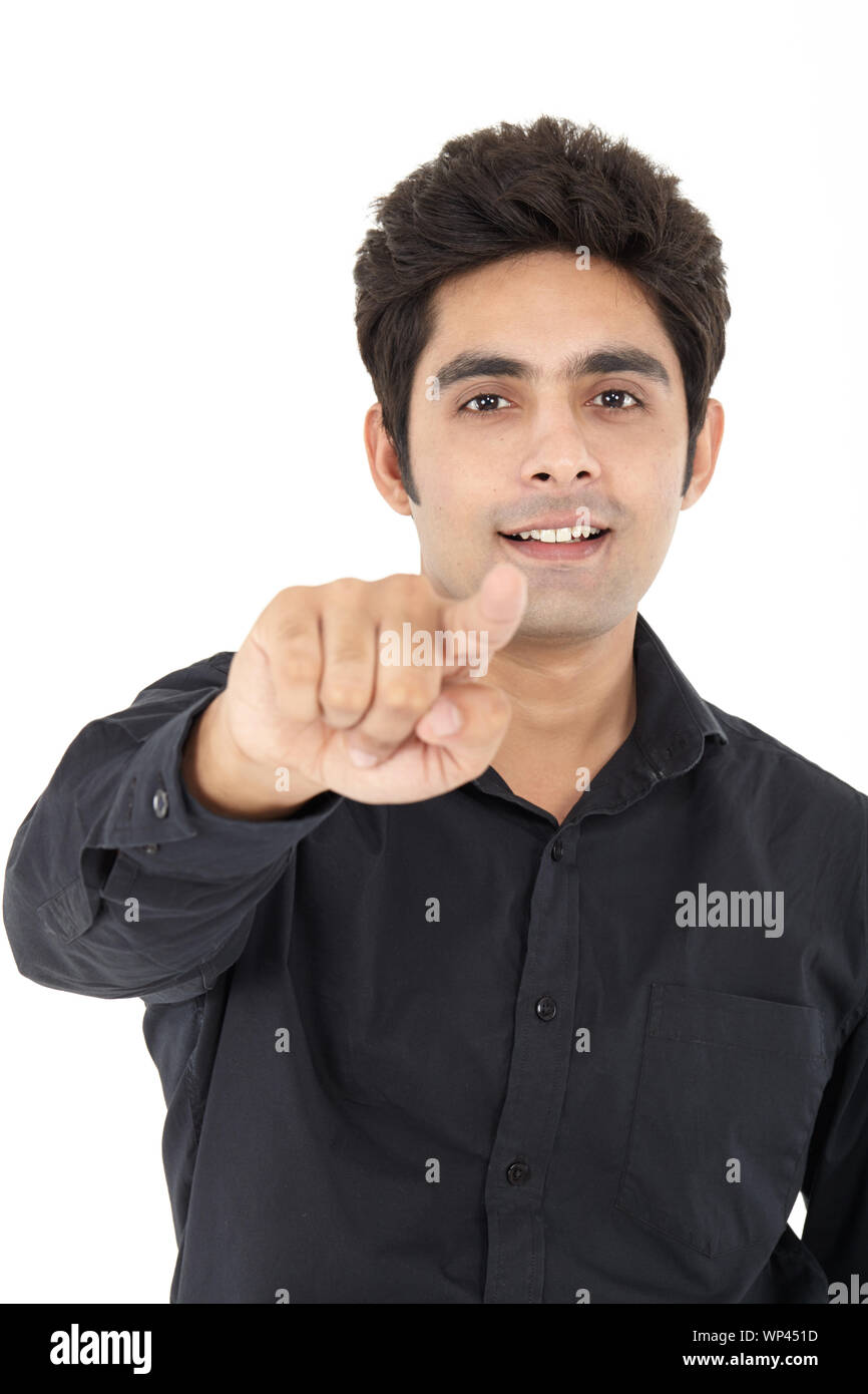 Portrait of businessman pointing towards camera Stock Photo - Alamy Portrait of businessman pointing towards camera Stock Photo - Alamy