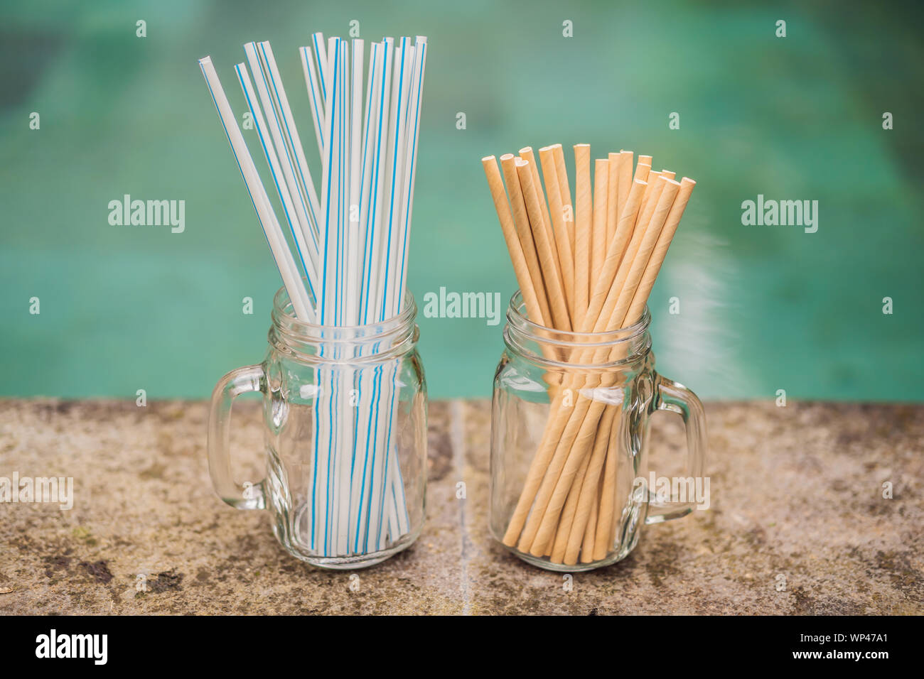 paper and plastic drinking straws on the background of the pool Stock ...