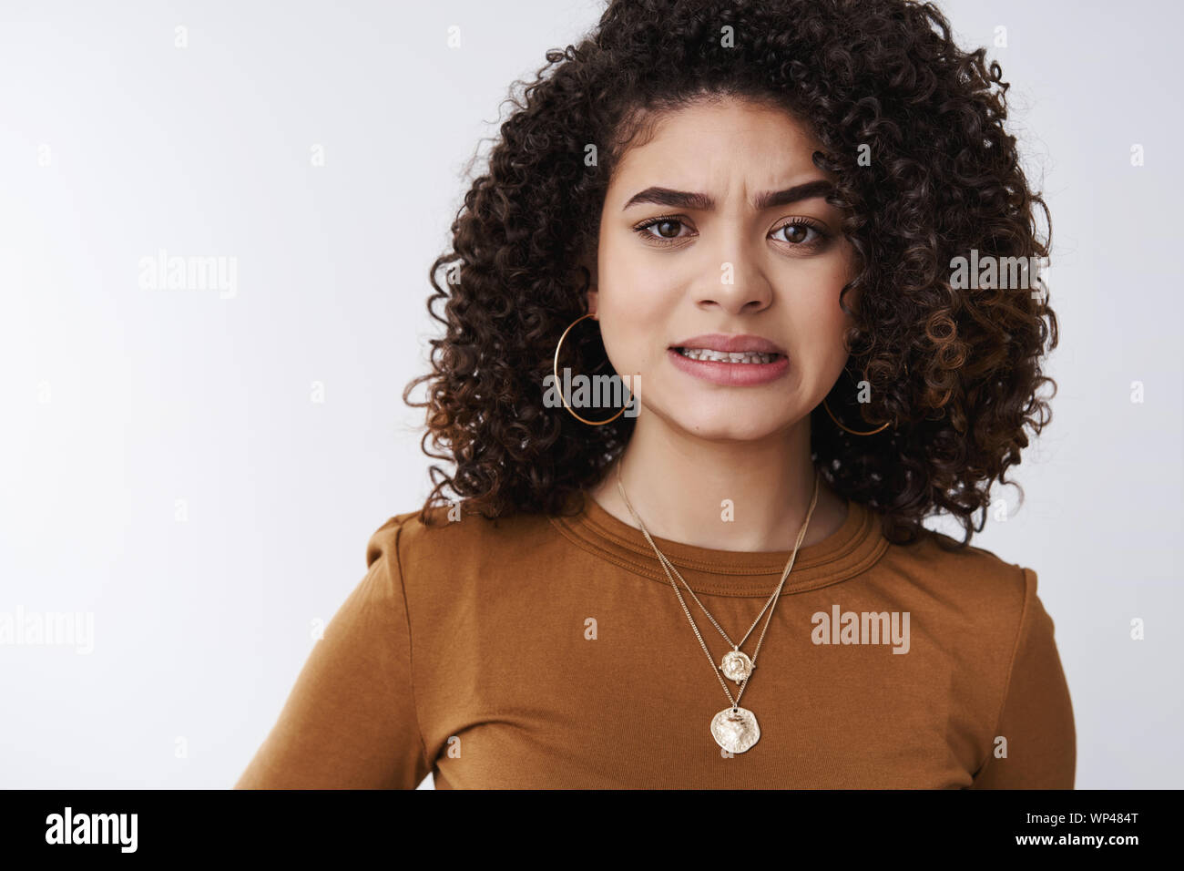 Cringing hi-res stock photography and images - Alamy