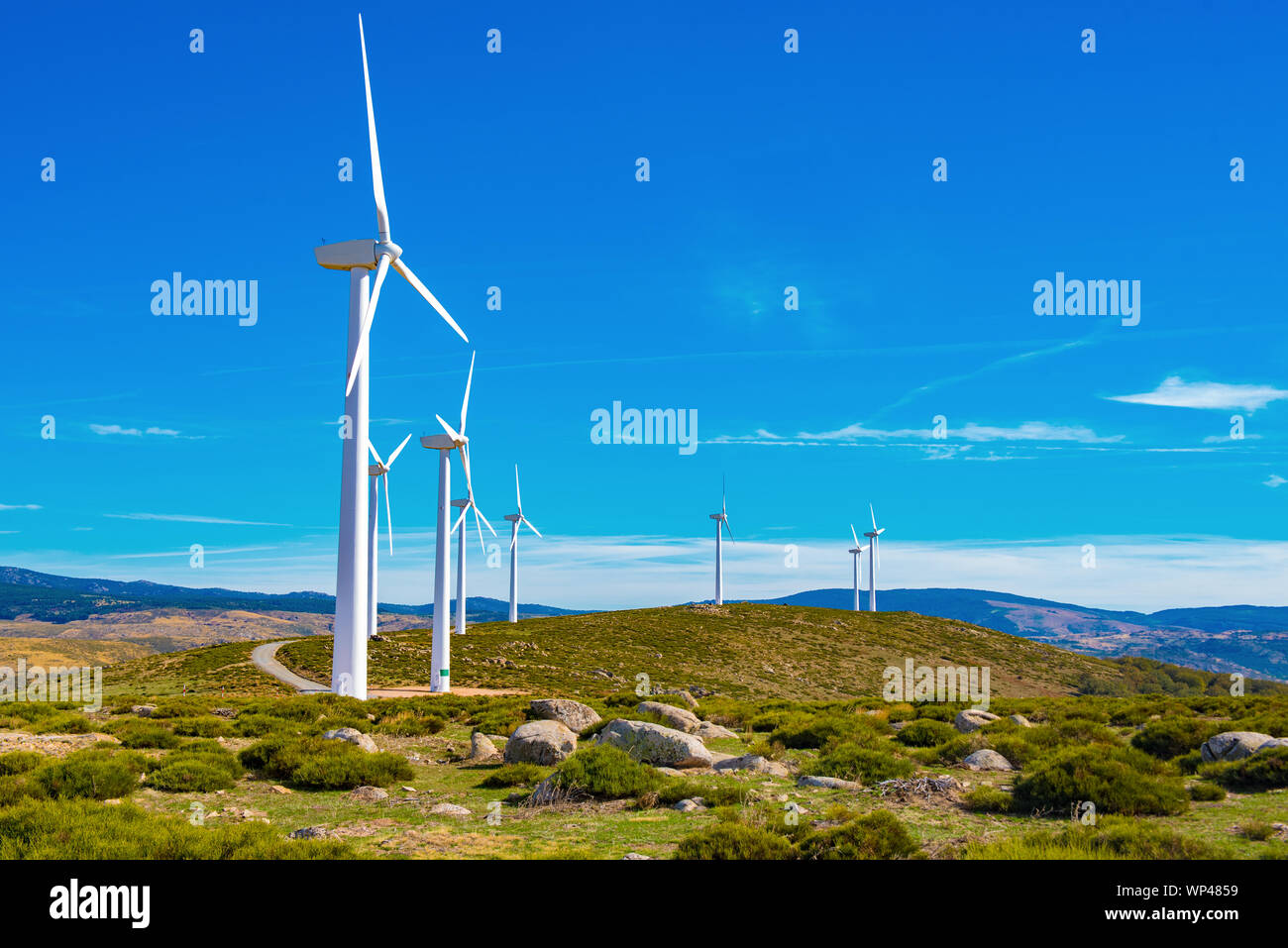 Line of wind turbines of a large windfarm in the mountains of central ...