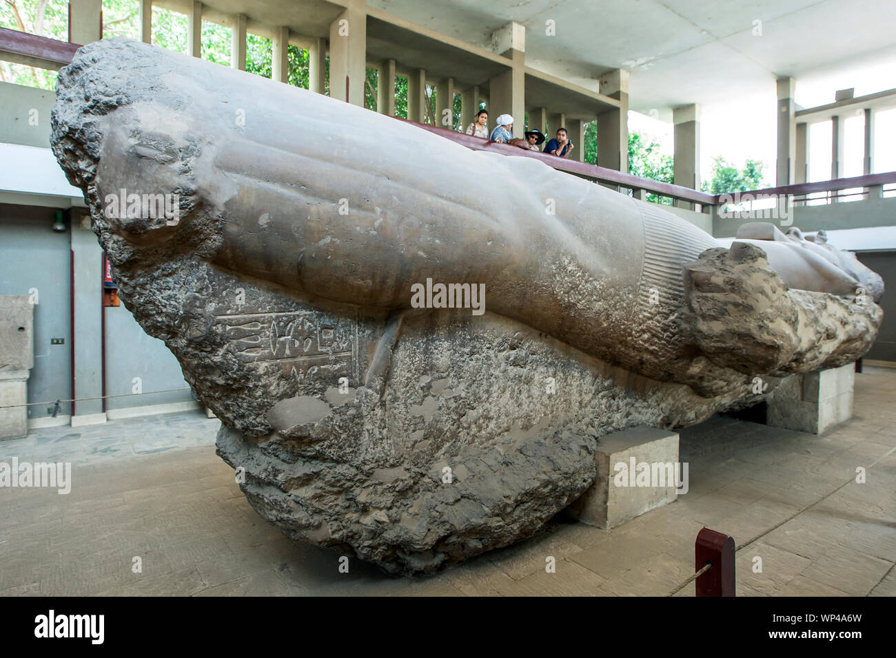 Hieroglyphs located on the base of the colossal carved limestone statue ...
