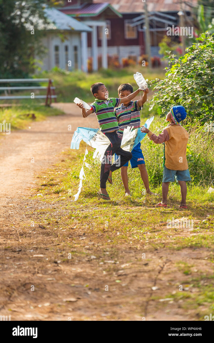 Happy kids playing in Myanmar Stock Photo - Alamy