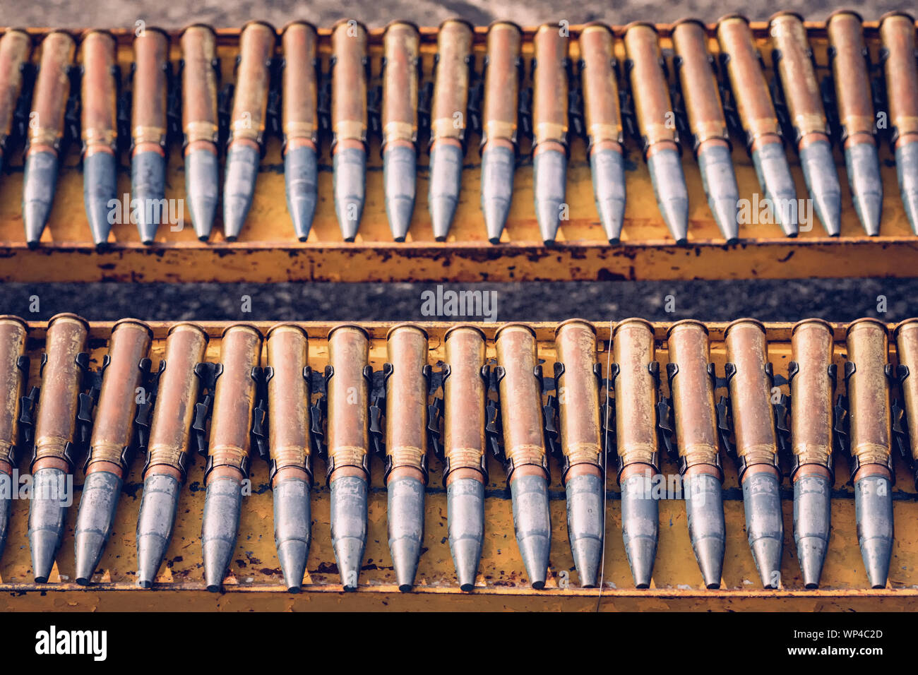 Close up shot of 23 millimeter bullet line Stock Photo - Alamy