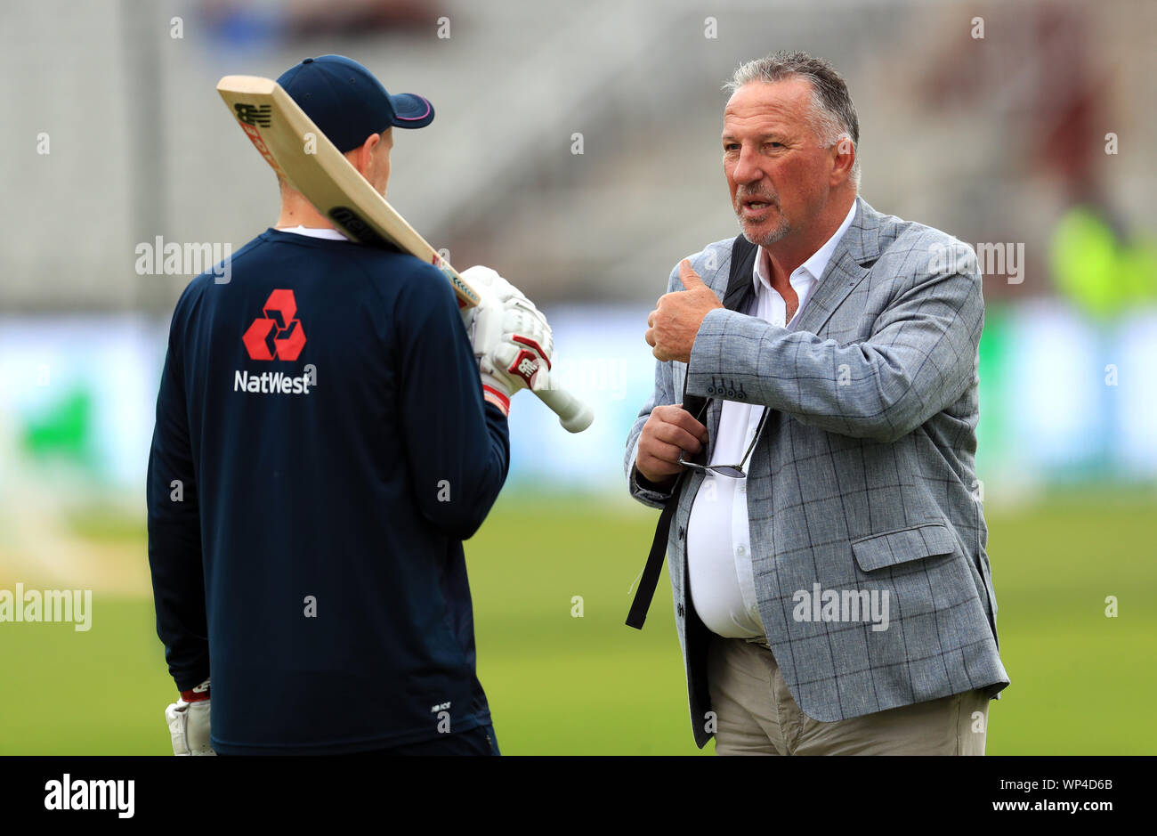 Sir Ian Botham (right) speaks to England's Joe Root ahead of day four ...