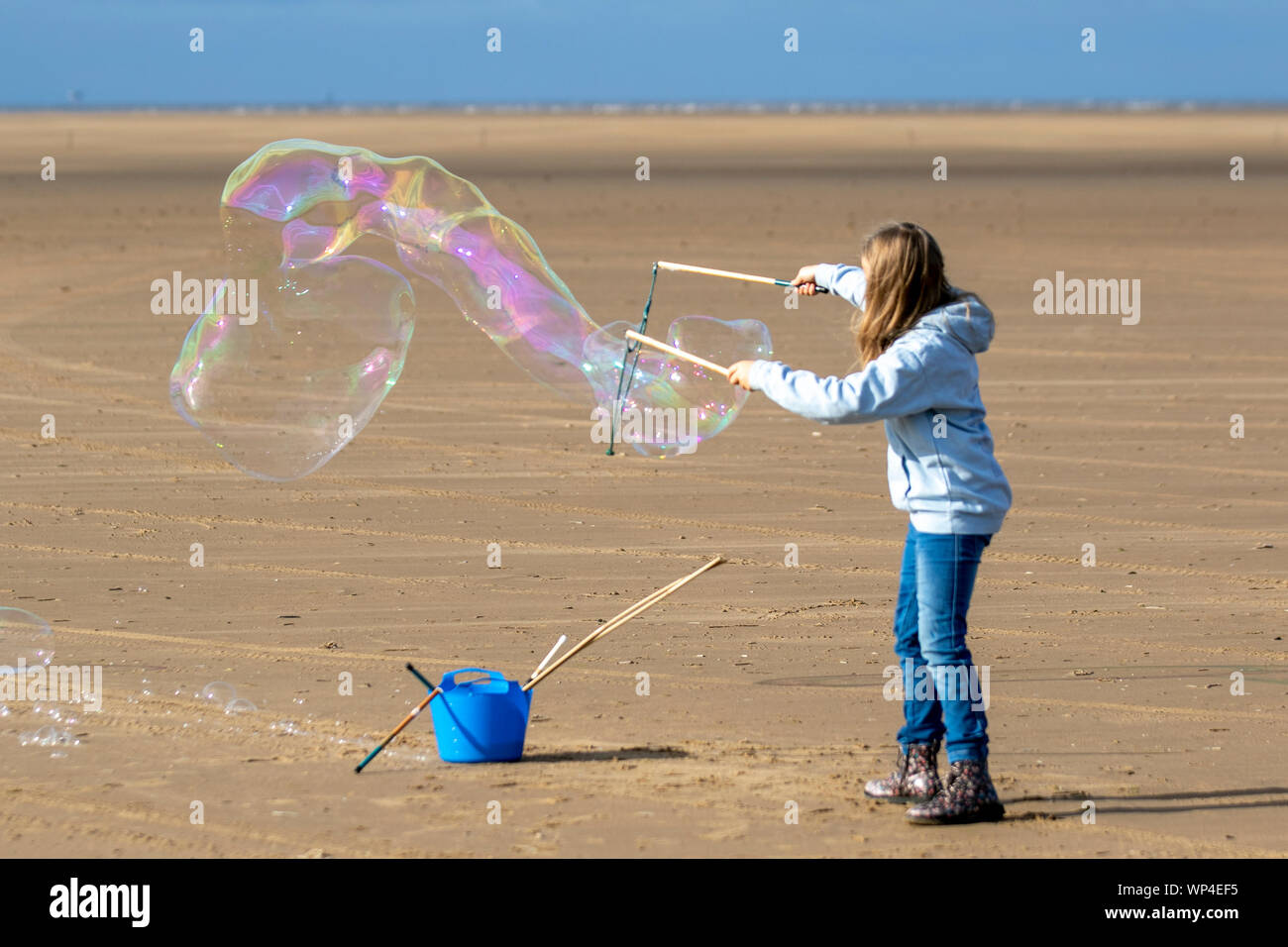 Children making huge soap hi-res stock photography and images - Alamy
