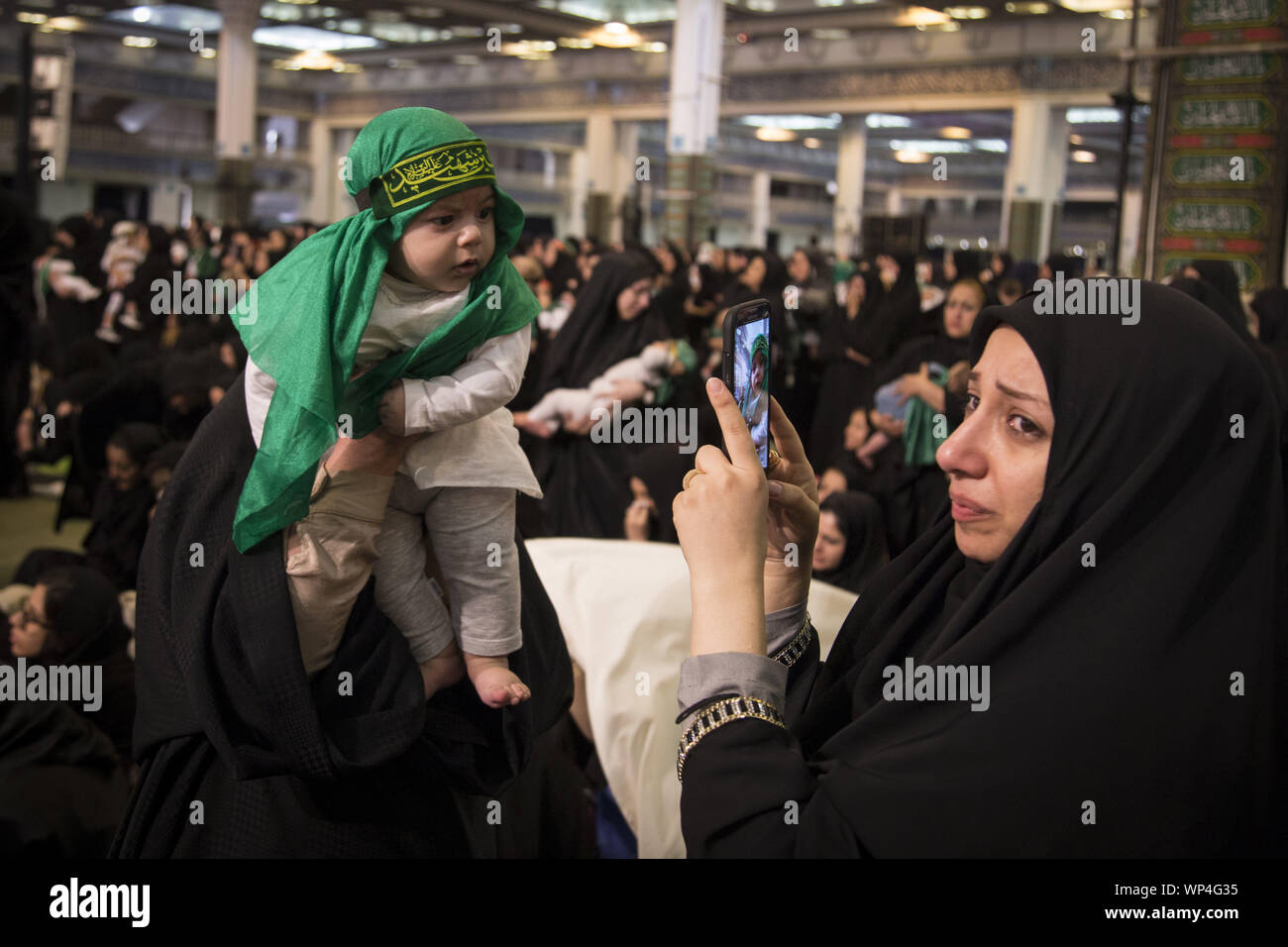 Tehran, Tehran, IRAN. 6th Sep, 2019. Iranian women hold their baby in ...