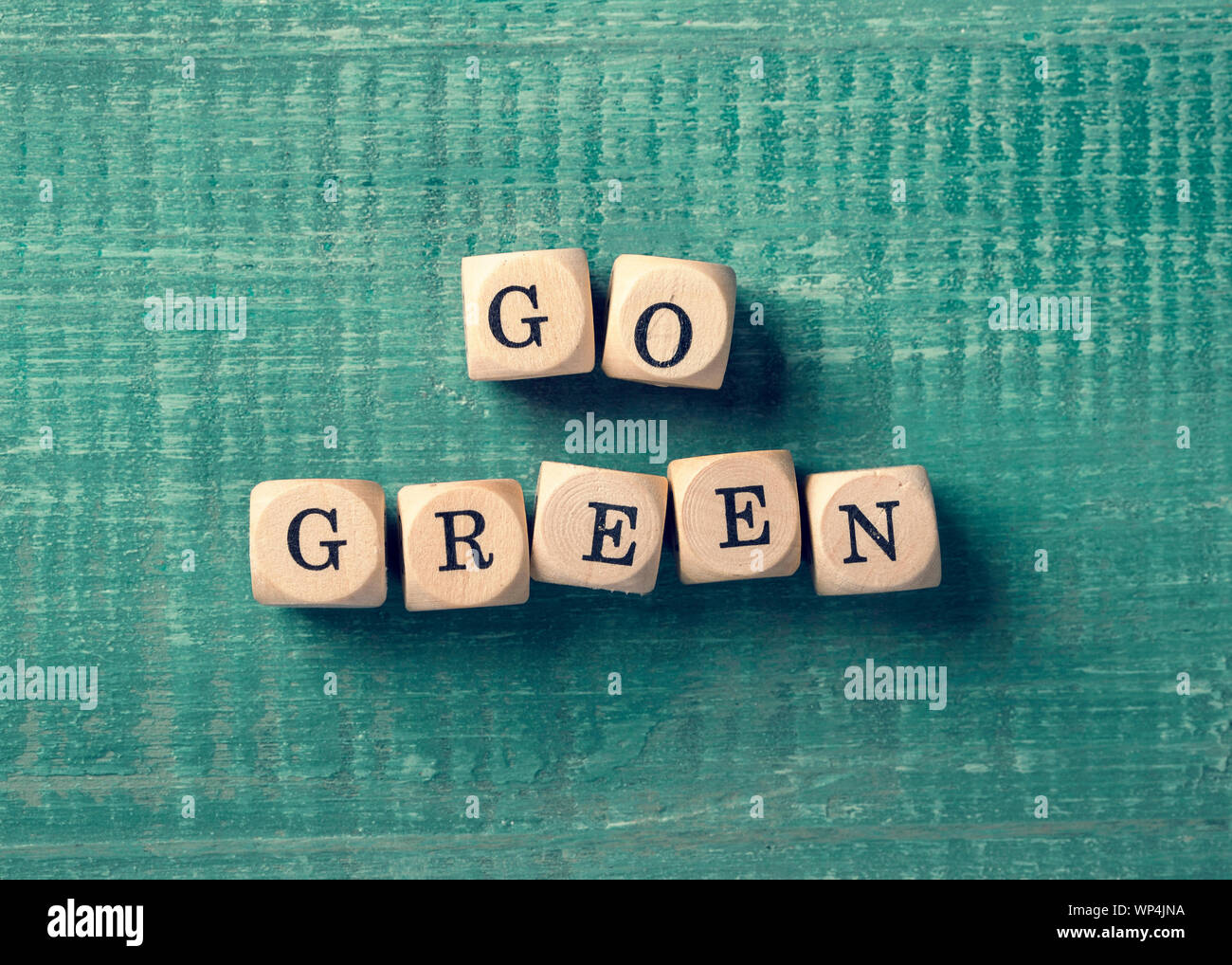 Letter cubes with word go green. Environment concept Stock Photo - Alamy