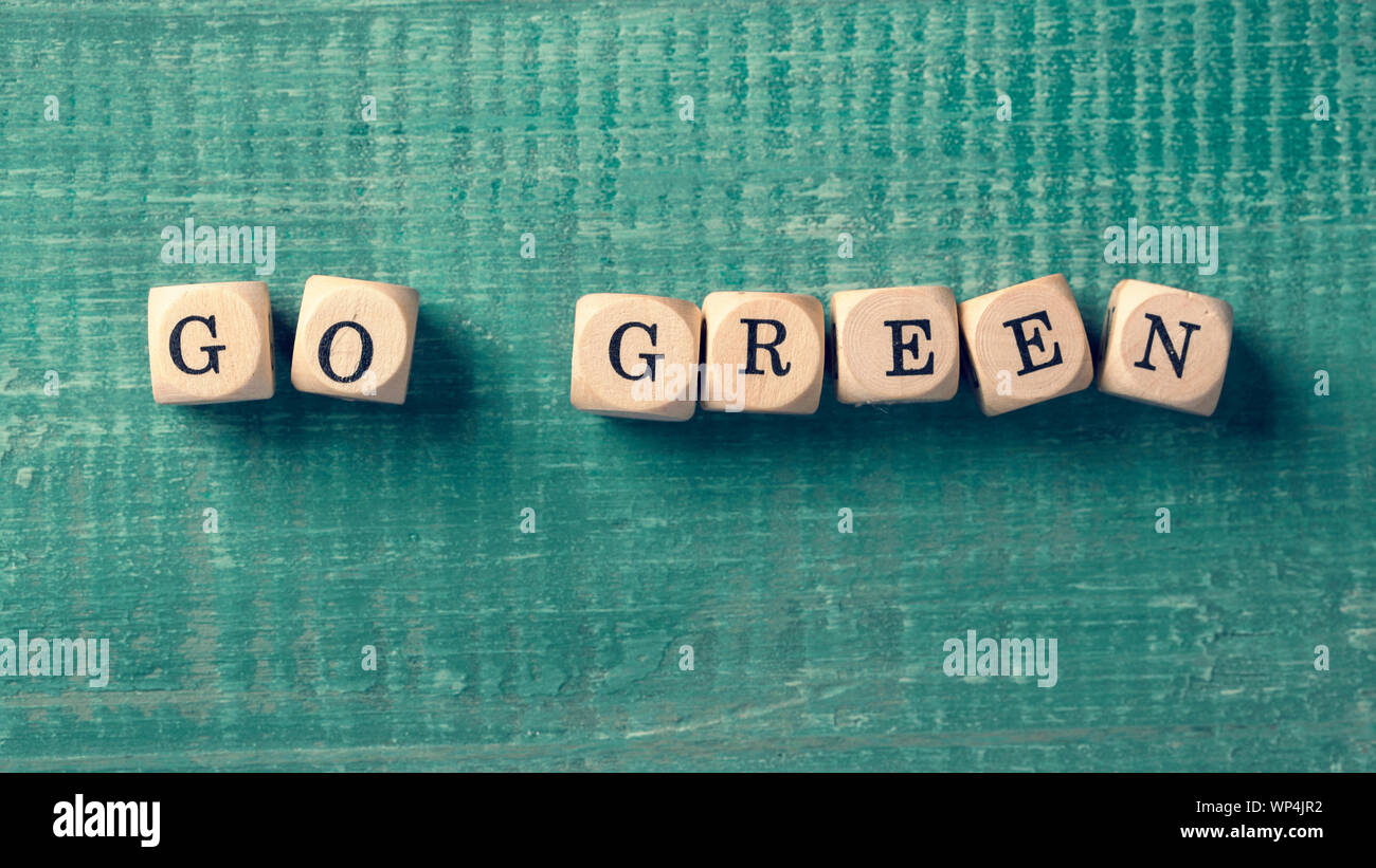 Letter cubes with word go green. Environment concept Stock Photo - Alamy