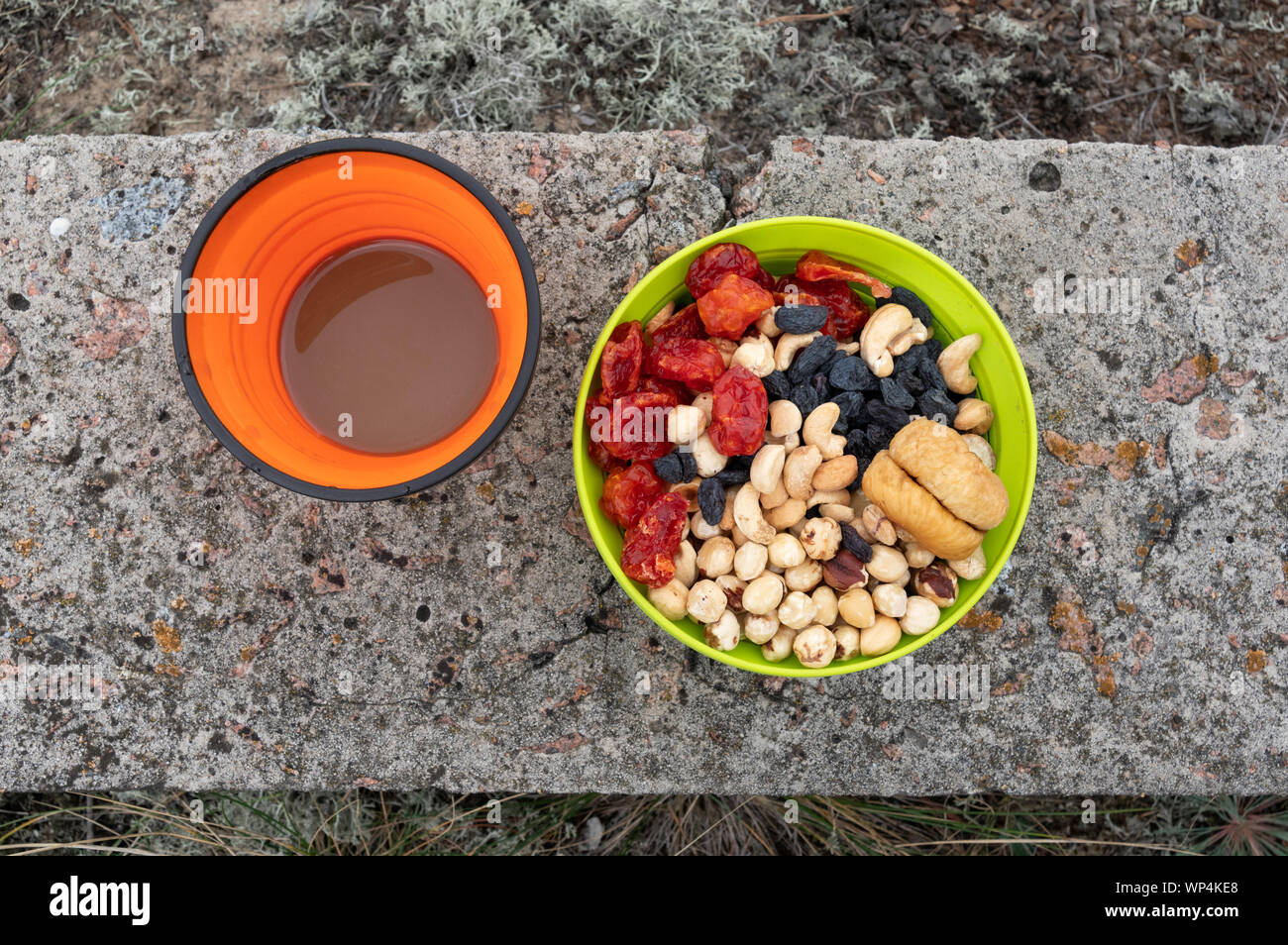 Multi-colored silicone dishes. Snack and coffee with milk Stock Photo ...