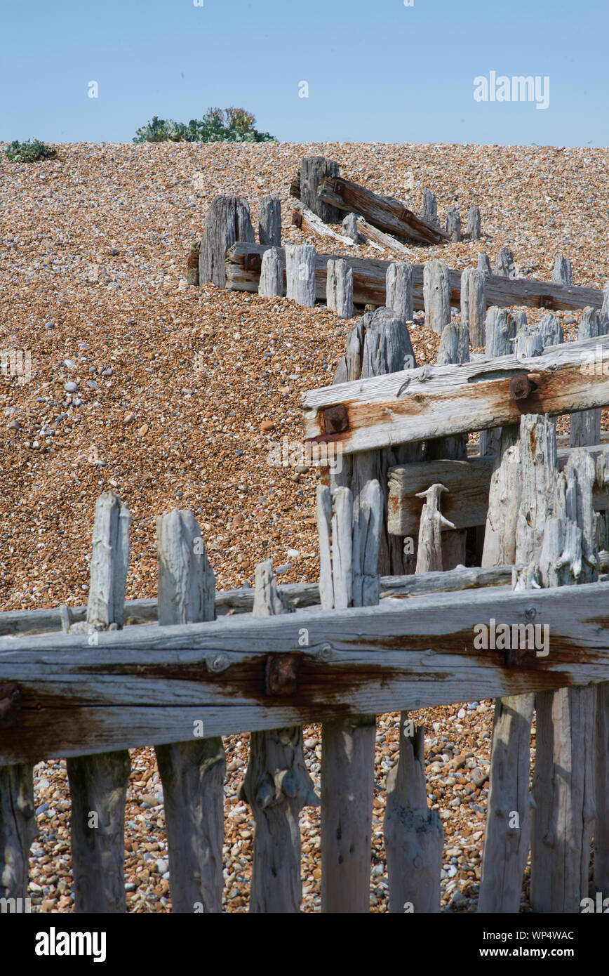 Rotten groynes on the beach hi-res stock photography and images - Alamy