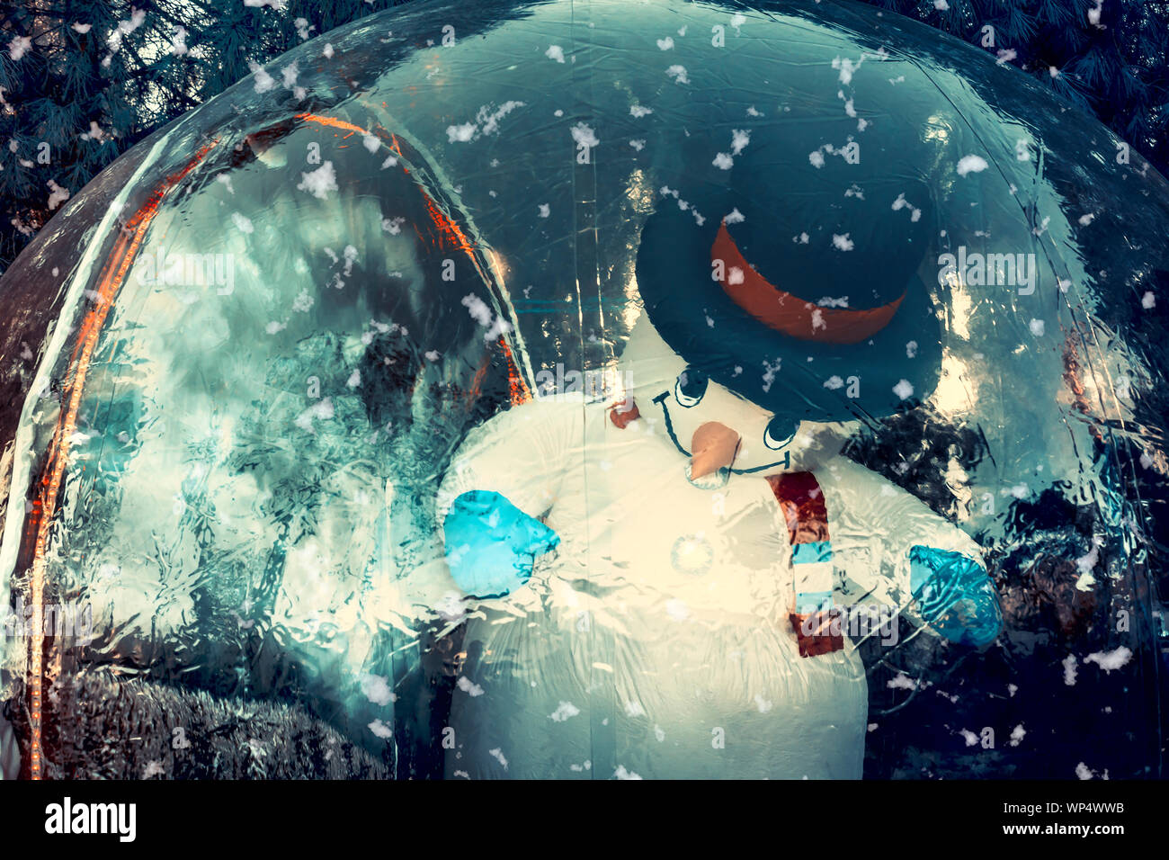 snowman inside a plastic ball on winter night at night Stock Photo - Alamy