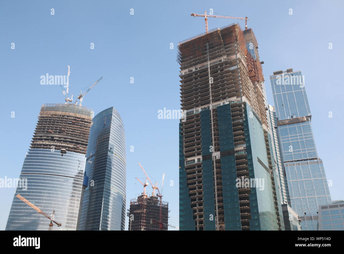 skyscraper develop on sky background Stock Photo - Alamy