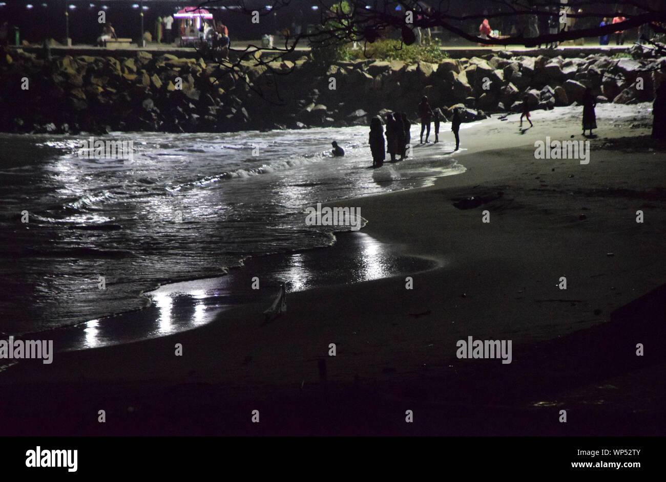 People on beach at night, cochin, kerala india Stock Photo - Alamy