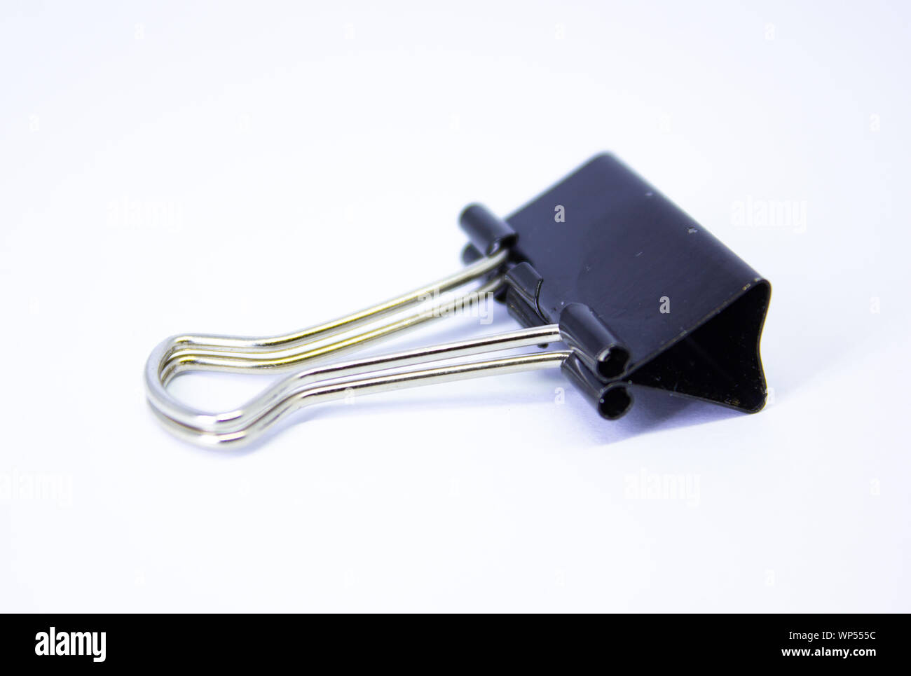 School stationary, Black paper clip isolated on white background Stock ...
