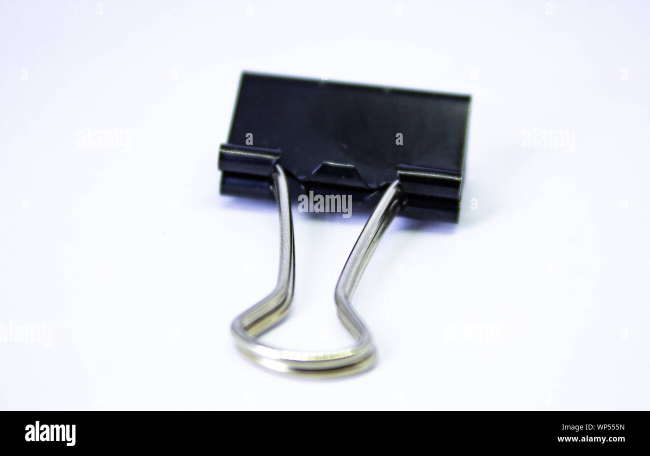 School stationary, Black paper clip isolated on white background Stock ...