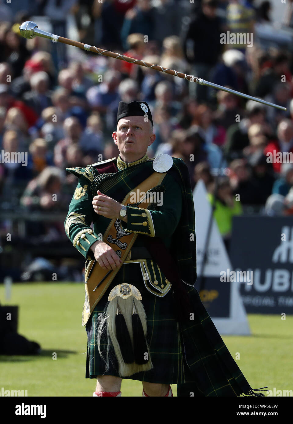 A pipe major throws hi-res stock photography and images - Alamy