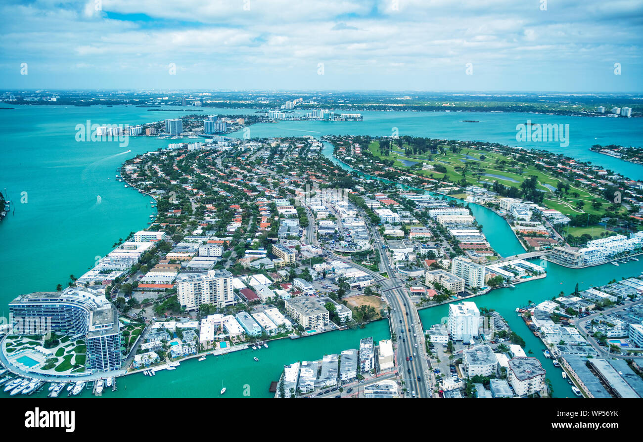 Amazing aerial view of Miami Islands and Causeway on a sunny day ...