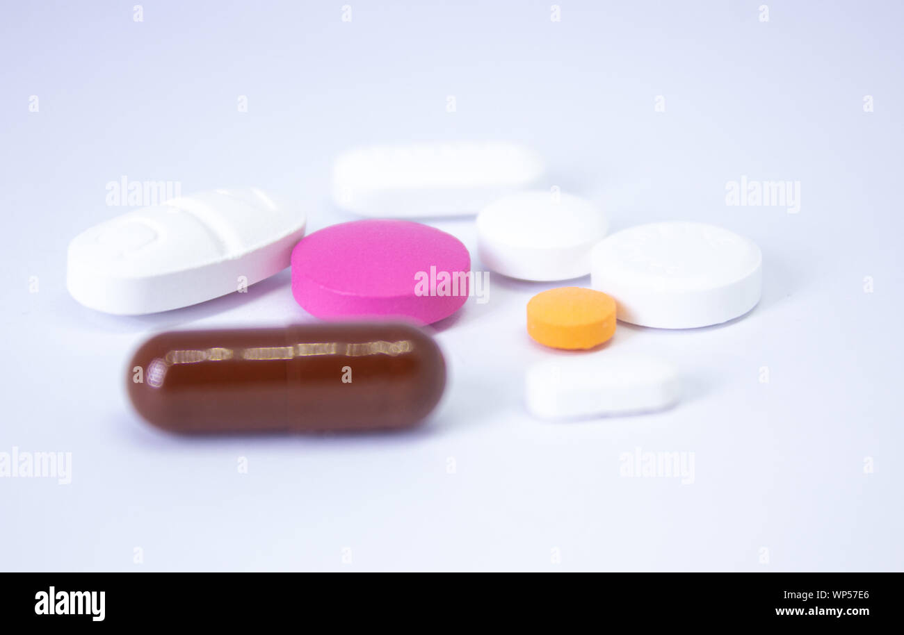 Pharmacy and Hospital theme. mix of pills and capsules with ...