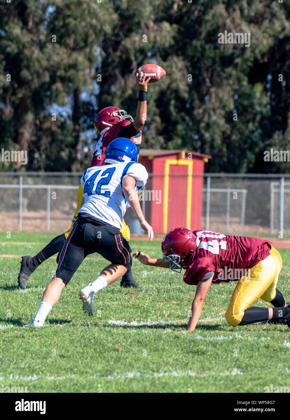 Number fourty two on the defense football team makes strong attempt to ...